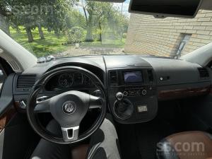 Black Volkswagen Multivan 2010 in Bauska, with an engine capacity of 2.00 L and mileage of 212 thousand km for 12500 €, photo 21 on AUTOMOTO.COM.LV