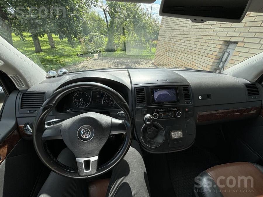 Black Volkswagen Multivan 2010 in Bauska, with an engine capacity of 2.00 L and mileage of 212 thousand km for 12500 €, photo 21 on AUTOMOTO.COM.LV