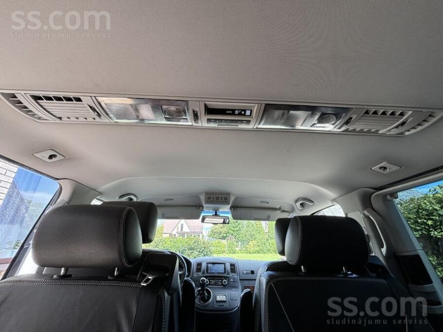 Black Volkswagen Multivan 2010 in Bauska, with an engine capacity of 2.00 L and mileage of 212 thousand km for 12500 €, photo 23 on AUTOMOTO.COM.LV