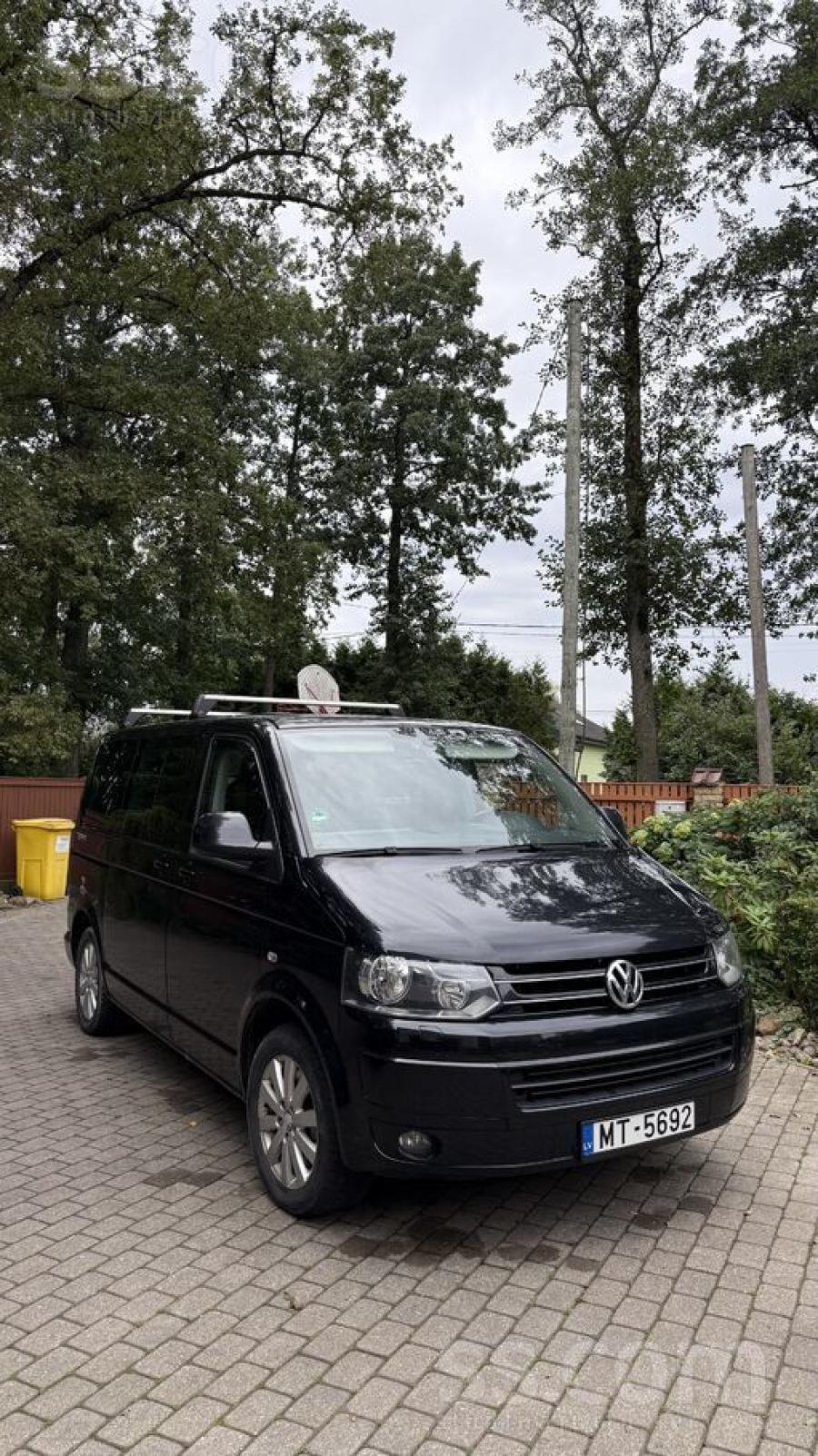 Melns Volkswagen Multivan 2011 Rīga, ar dzinēja tilpumu 2.00 L un nobraukumu 263 tūkst. km par 17300 €, foto 1 vietnē AUTOMOTO.COM.LV