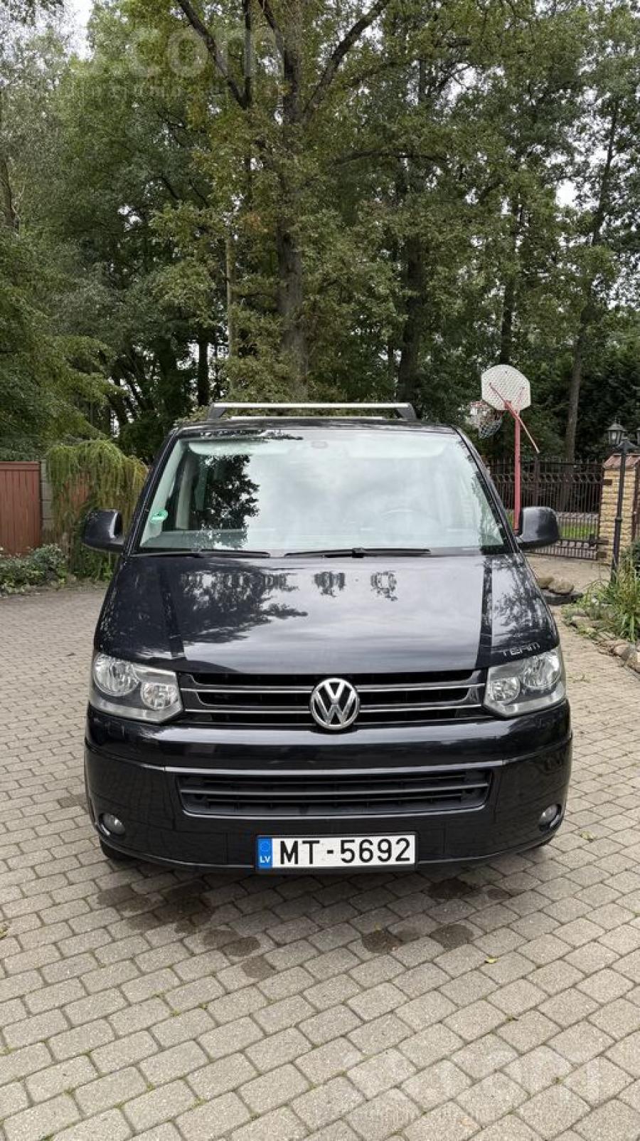 Melns Volkswagen Multivan 2011 Rīga, ar dzinēja tilpumu 2.00 L un nobraukumu 263 tūkst. km par 17300 €, foto 4 vietnē AUTOMOTO.COM.LV