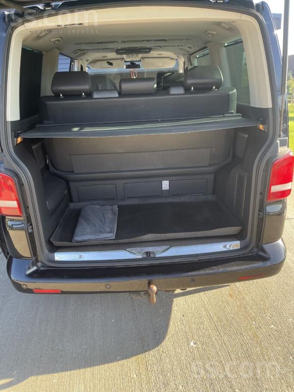 Black Volkswagen Multivan 2011 in Riga, with an engine capacity of 2.00 L and mileage of 435 thousand km for 11000 €, photo 7 on AUTOMOTO.COM.LV