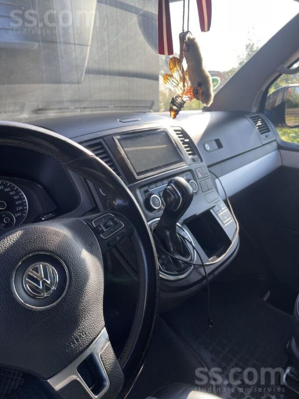 Black Volkswagen Multivan 2011 in Riga, with an engine capacity of 2.00 L and mileage of 435 thousand km for 11000 €, photo 8 on AUTOMOTO.COM.LV