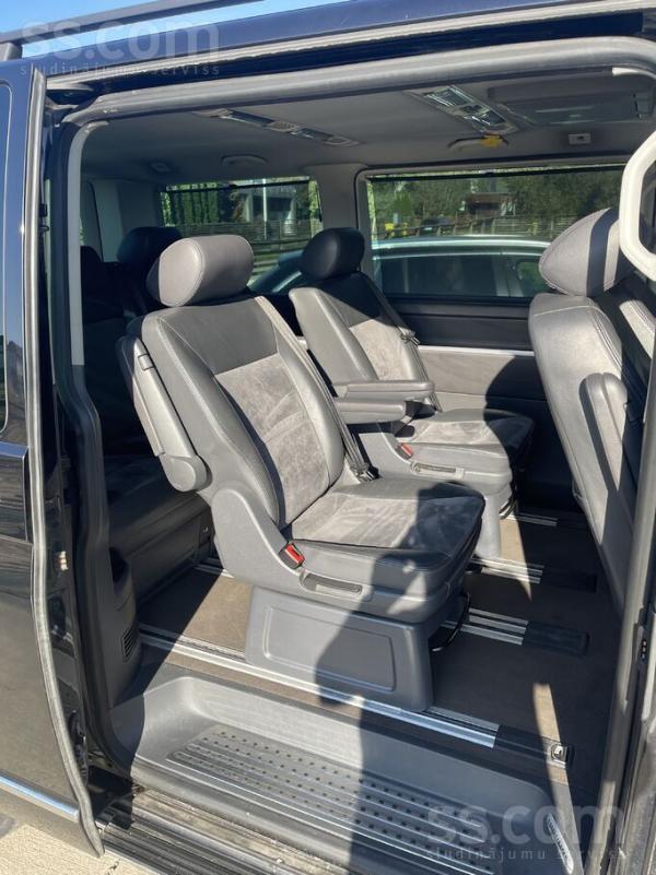 Black Volkswagen Multivan 2011 in Riga, with an engine capacity of 2.00 L and mileage of 435 thousand km for 11000 €, photo 10 on AUTOMOTO.COM.LV