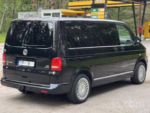 Black Volkswagen Multivan 2012 in Riga, with an engine capacity of 2.00 L and mileage of 216 thousand km for 18000 €, photo 5 on AUTOMOTO.COM.LV