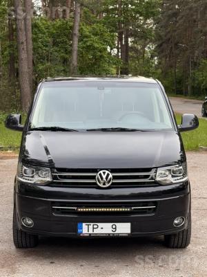 Black Volkswagen Multivan 2012 in Riga, with an engine capacity of 2.00 L and mileage of 216 thousand km for 18000 €, photo 7 on AUTOMOTO.COM.LV