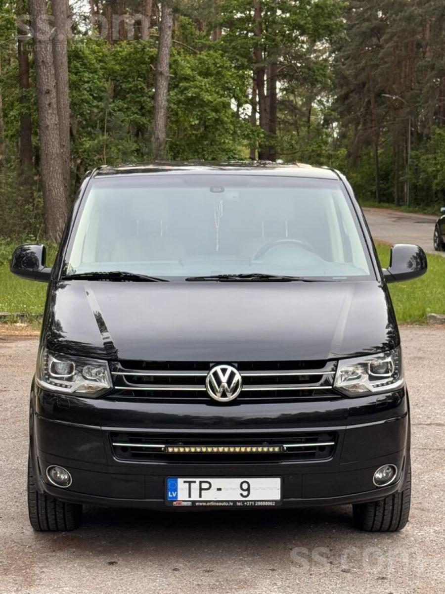 Black Volkswagen Multivan 2012 in Riga, with an engine capacity of 2.00 L and mileage of 216 thousand km for 18000 €, photo 7 on AUTOMOTO.COM.LV