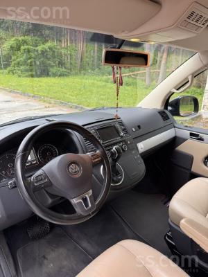 Black Volkswagen Multivan 2012 in Riga, with an engine capacity of 2.00 L and mileage of 216 thousand km for 18000 €, photo 8 on AUTOMOTO.COM.LV