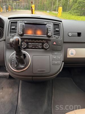 Black Volkswagen Multivan 2012 in Riga, with an engine capacity of 2.00 L and mileage of 216 thousand km for 18000 €, photo 9 on AUTOMOTO.COM.LV