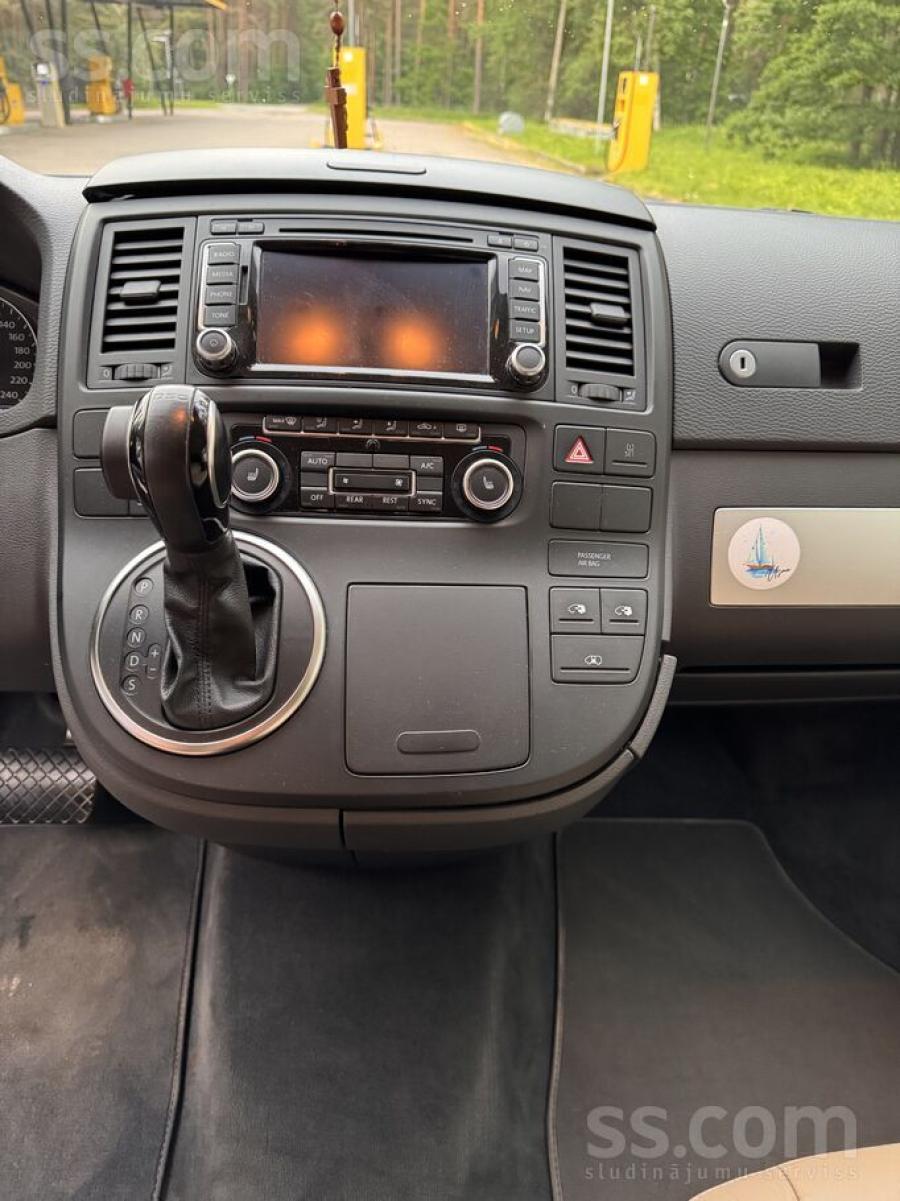 Black Volkswagen Multivan 2012 in Riga, with an engine capacity of 2.00 L and mileage of 216 thousand km for 18000 €, photo 9 on AUTOMOTO.COM.LV