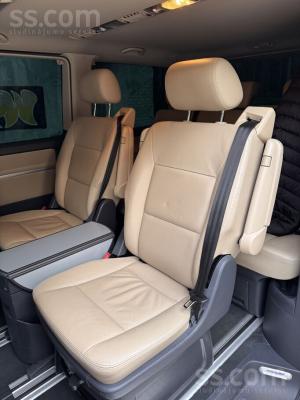 Black Volkswagen Multivan 2012 in Riga, with an engine capacity of 2.00 L and mileage of 216 thousand km for 18000 €, photo 11 on AUTOMOTO.COM.LV