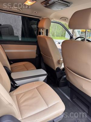 Black Volkswagen Multivan 2012 in Riga, with an engine capacity of 2.00 L and mileage of 216 thousand km for 18000 €, photo 12 on AUTOMOTO.COM.LV