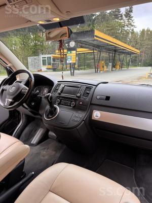 Black Volkswagen Multivan 2012 in Riga, with an engine capacity of 2.00 L and mileage of 216 thousand km for 18000 €, photo 13 on AUTOMOTO.COM.LV