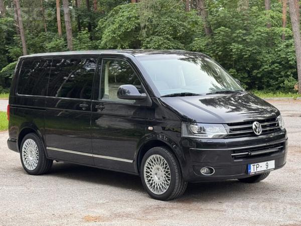 Black Volkswagen Multivan 2012 in Riga, with an engine capacity of 2.00 L and mileage of 216 thousand km for 17500 €, photo 5 on AUTOMOTO.COM.LV