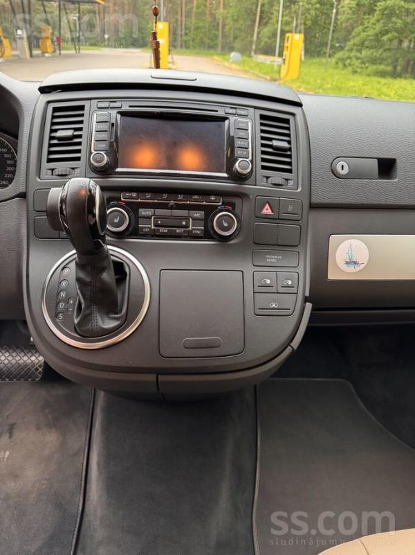 Black Volkswagen Multivan 2012 in Riga, with an engine capacity of 2.00 L and mileage of 216 thousand km for 17500 €, photo 8 on AUTOMOTO.COM.LV