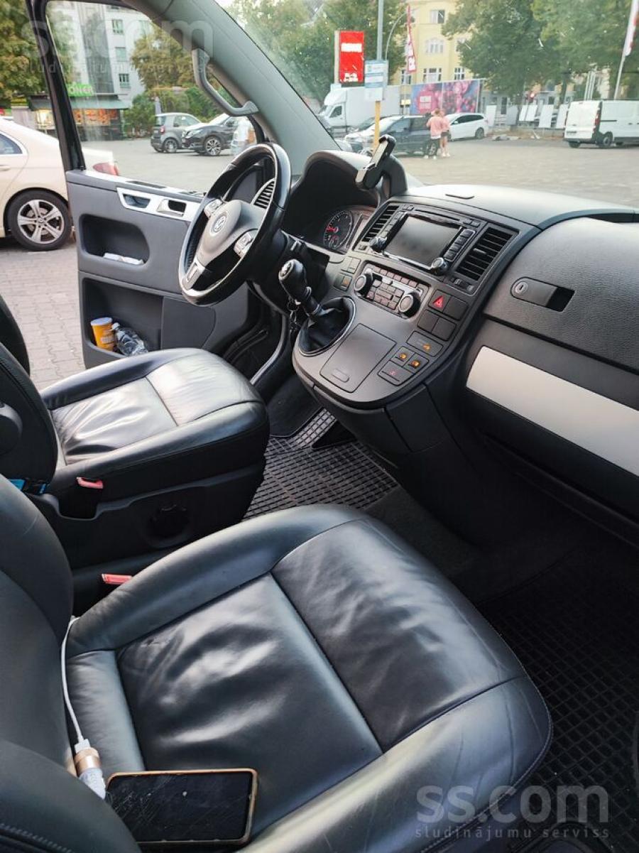 Melns Volkswagen Multivan 2012 Rīga, ar dzinēja tilpumu 2.00 L un nobraukumu 0 tūkst. km par 17000 €, foto 14 vietnē AUTOMOTO.COM.LV