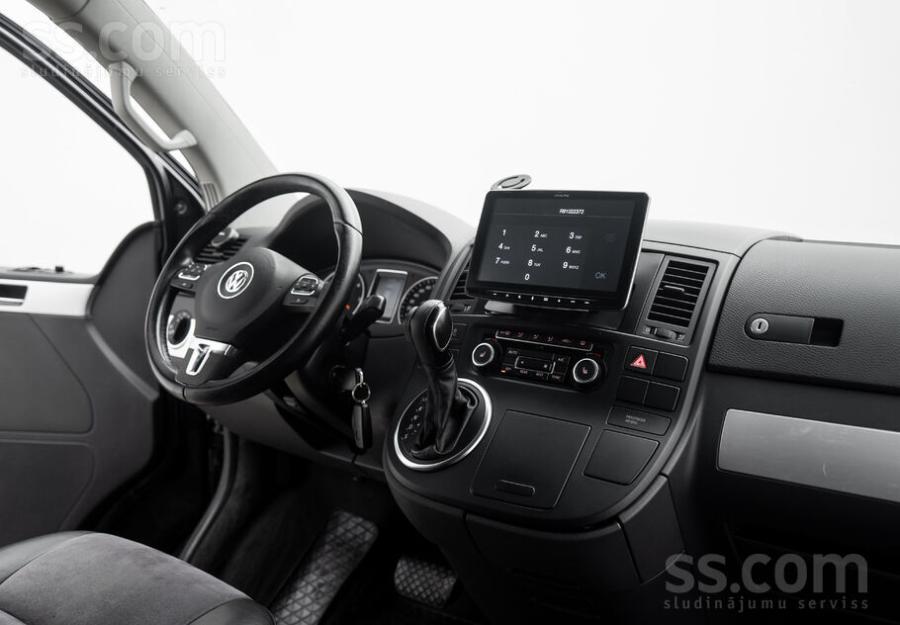 Melns Volkswagen Multivan 2013 Rīga, ar dzinēja tilpumu 2.00 L un nobraukumu 210 tūkst. km par 19999 €, foto 12 vietnē AUTOMOTO.COM.LV