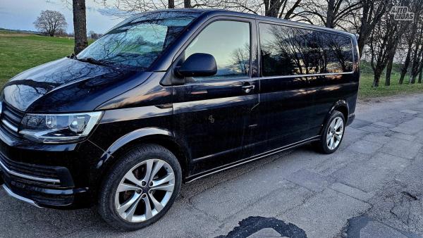 Melns Volkswagen Multivan 2013 Kaišiadorys, ar dzinēja tilpumu 2.00 L un nobraukumu 380 tūkst. km par 14800 €, foto 1 vietnē AUTOMOTO.COM.LV