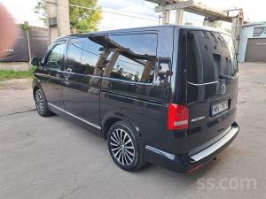 Black Volkswagen Multivan 2013 in Riga, with an engine capacity of 2.00 L and mileage of 296 thousand km for 19350 €, photo 4 on AUTOMOTO.COM.LV