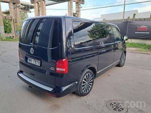 Black Volkswagen Multivan 2013 in Riga, with an engine capacity of 2.00 L and mileage of 296 thousand km for 19350 €, photo 5 on AUTOMOTO.COM.LV