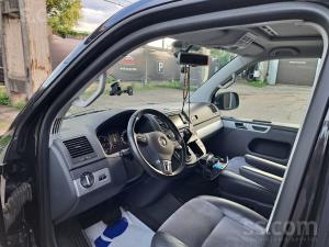 Black Volkswagen Multivan 2013 in Riga, with an engine capacity of 2.00 L and mileage of 296 thousand km for 19350 €, photo 6 on AUTOMOTO.COM.LV