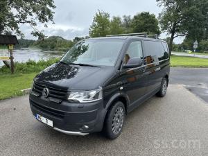 Melns Volkswagen Multivan 2014 Rīga, ar dzinēja tilpumu 2.00 L un nobraukumu 210 tūkst. km par 27000 €, foto  vietnē AUTOMOTO.COM.LV
