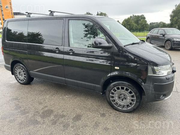 Black Volkswagen Multivan 2014 in Riga, with an engine capacity of 2.00 L and mileage of 210 thousand km for 27000 €, photo 5 on AUTOMOTO.COM.LV