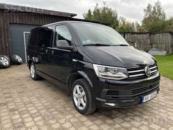 Black Volkswagen Multivan 2015 in Dobele, with an engine capacity of 2.00 L and mileage of 300 thousand km for 20500 €, photo 2 on AUTOMOTO.COM.LV