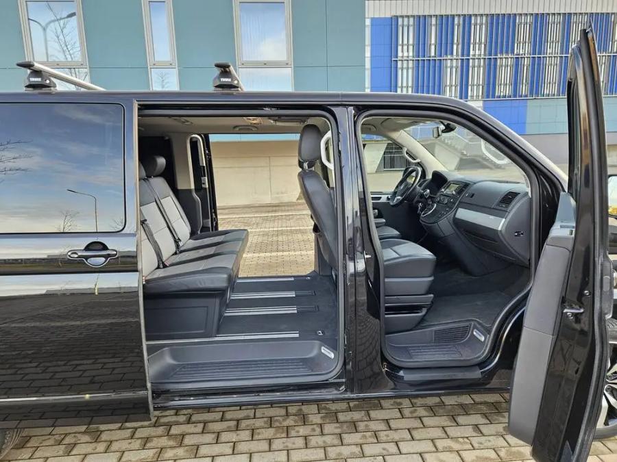 Melns Volkswagen Multivan 2015 Jēkabpils, ar dzinēja tilpumu 2.00 L un nobraukumu 148 tūkst. km par 23900 €, foto 19 vietnē AUTOMOTO.COM.LV