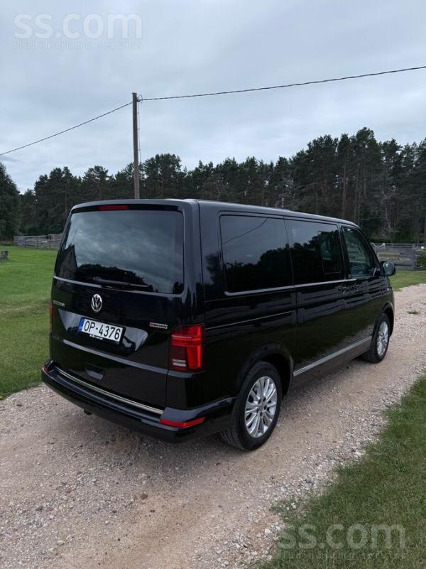 Black Volkswagen Multivan 2021 in Riga, with an engine capacity of 2.00 L and mileage of 237 thousand km for 35850 €, photo 5 on AUTOMOTO.COM.LV