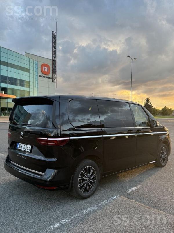 Black Volkswagen Multivan 2023 in Riga, with an engine capacity of 2.00 L and mileage of 35 thousand km for 50000 €, photo 2 on AUTOMOTO.COM.LV
