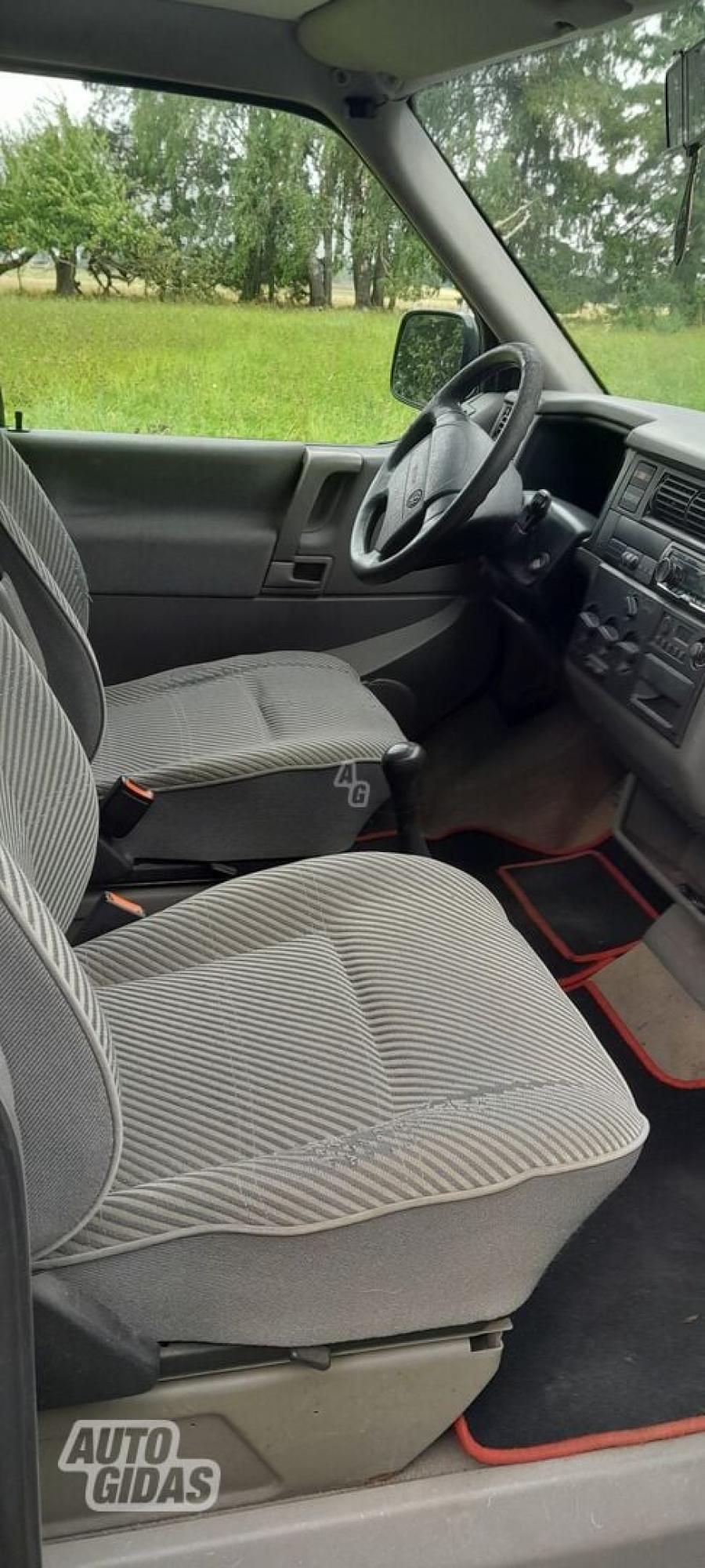Black Volkswagen Multivan 1998 in Panevezys, with an engine capacity of 2.50 L and mileage of 315 thousand km for 1999 €, photo 24 on AUTOMOTO.COM.LV