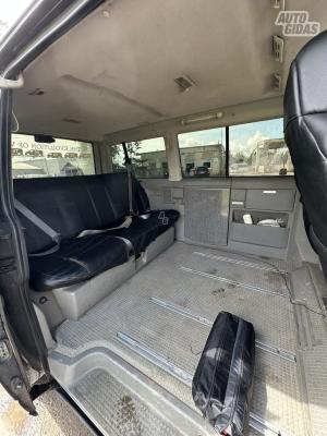 Black Volkswagen Multivan 1999 in Ariogala, with an engine capacity of 2.50 L and mileage of 478 thousand km for 2200 €, photo 6 on AUTOMOTO.COM.LV