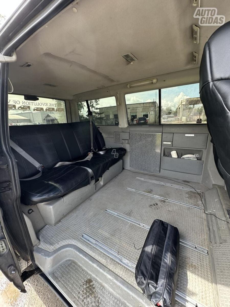Black Volkswagen Multivan 1999 in Ariogala, with an engine capacity of 2.50 L and mileage of 478 thousand km for 2200 €, photo 6 on AUTOMOTO.COM.LV