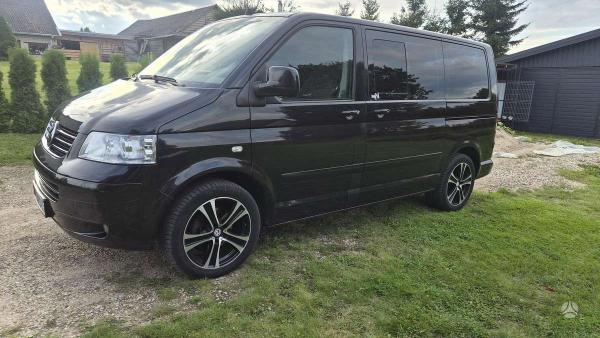 Black Volkswagen Multivan 2005 in Utena, with an engine capacity of 2.46 L and mileage of 370 thousand km for 6999 €, photo 4 on AUTOMOTO.COM.LV