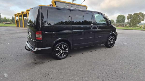 Black Volkswagen Multivan 2005 in Utena, with an engine capacity of 2.46 L and mileage of 370 thousand km for 6999 €, photo 7 on AUTOMOTO.COM.LV