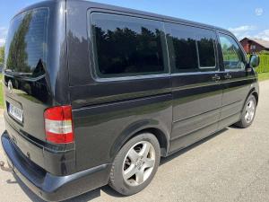 Black Volkswagen Multivan 2006 in Plunge, with an engine capacity of 2.46 L and mileage of 281 thousand km for 6800 €, photo 6 on AUTOMOTO.COM.LV