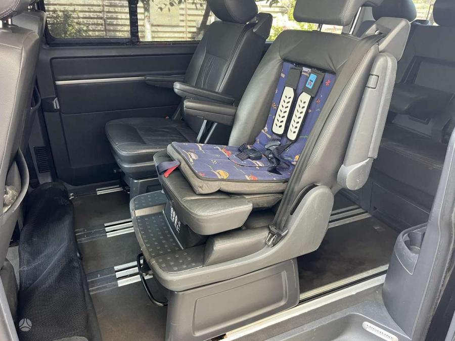 Black Volkswagen Multivan 2006 in Plunge, with an engine capacity of 2.46 L and mileage of 281 thousand km for 6800 €, photo 14 on AUTOMOTO.COM.LV