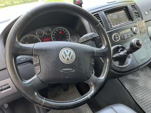 Black Volkswagen Multivan 2006 in Plunge, with an engine capacity of 2.46 L and mileage of 281 thousand km for 6800 €, photo 24 on AUTOMOTO.COM.LV