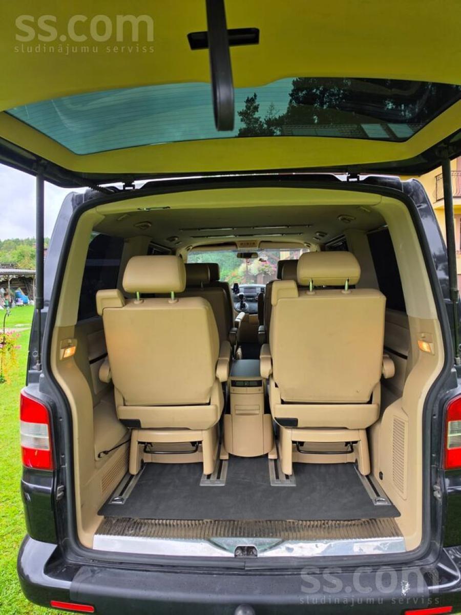 Melns Volkswagen Multivan 2006 Rīga, ar dzinēja tilpumu 2.50 L un nobraukumu 270 tūkst. km par 8400 €, foto 10 vietnē AUTOMOTO.COM.LV