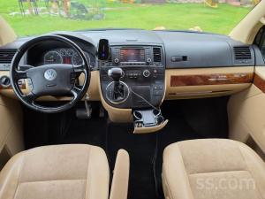 Melns Volkswagen Multivan 2006 Rīga, ar dzinēja tilpumu 2.50 L un nobraukumu 270 tūkst. km par 8400 €, foto 13 vietnē AUTOMOTO.COM.LV
