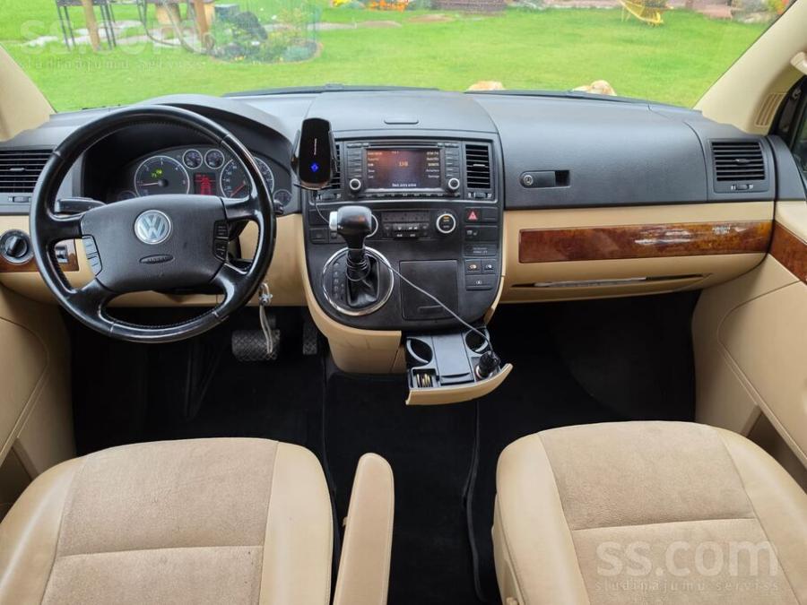 Melns Volkswagen Multivan 2006 Rīga, ar dzinēja tilpumu 2.50 L un nobraukumu 270 tūkst. km par 8400 €, foto 13 vietnē AUTOMOTO.COM.LV