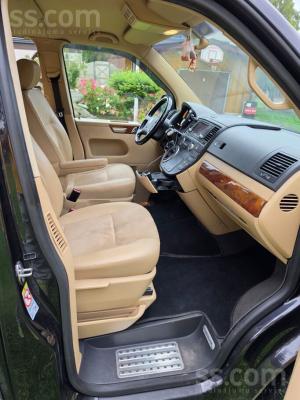 Melns Volkswagen Multivan 2006 Rīga, ar dzinēja tilpumu 2.50 L un nobraukumu 270 tūkst. km par 8400 €, foto 15 vietnē AUTOMOTO.COM.LV