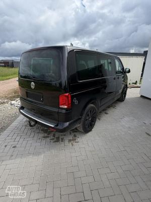 Black Volkswagen Multivan 2007 in Kaunas, with an engine capacity of 2.50 L and mileage of 300 thousand km for 6100 €, photo 6 on AUTOMOTO.COM.LV
