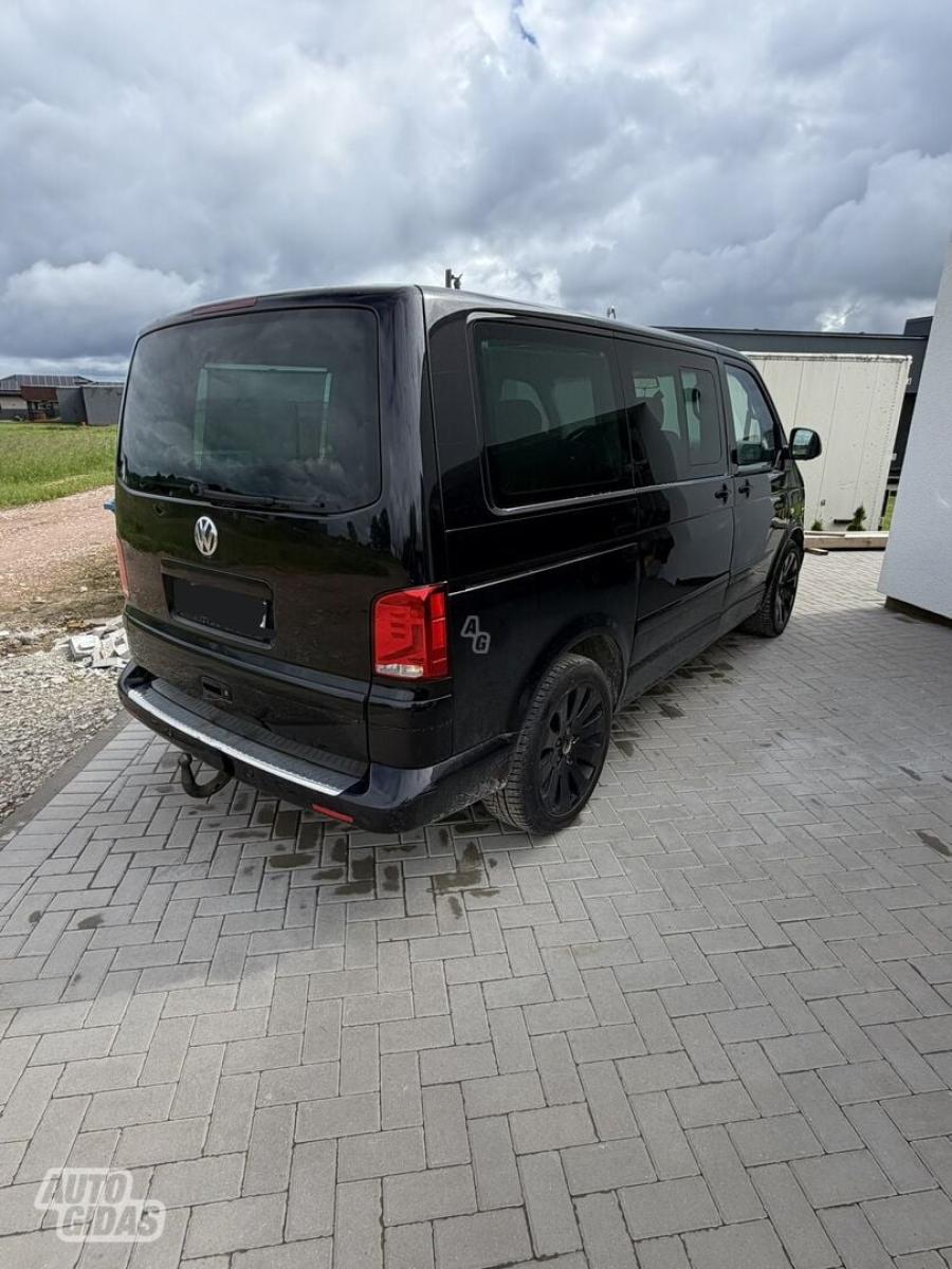 Black Volkswagen Multivan 2007 in Kaunas, with an engine capacity of 2.50 L and mileage of 300 thousand km for 6100 €, photo 6 on AUTOMOTO.COM.LV