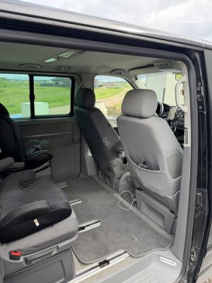 Black Volkswagen Multivan 2007 in Kaunas, with an engine capacity of 2.50 L and mileage of 300 thousand km for 6100 €, photo 7 on AUTOMOTO.COM.LV