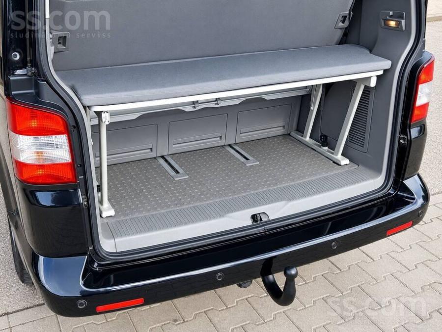 Black Volkswagen Multivan 2007 in Tukums, with an engine capacity of 1.90 L and mileage of 337 thousand km for 9990 €, photo 6 on AUTOMOTO.COM.LV