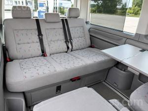 Black Volkswagen Multivan 2007 in Tukums, with an engine capacity of 1.90 L and mileage of 337 thousand km for 9990 €, photo 11 on AUTOMOTO.COM.LV