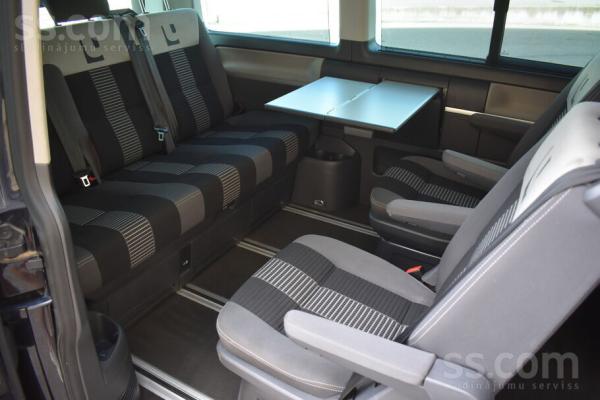Black Volkswagen Multivan 2009 in Talsi, with an engine capacity of 2.50 L and mileage of 315 thousand km for 10800 €, photo 10 on AUTOMOTO.COM.LV