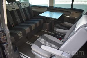 Black Volkswagen Multivan 2009 in Talsi, with an engine capacity of 2.50 L and mileage of 315 thousand km for 10800 €, photo 11 on AUTOMOTO.COM.LV
